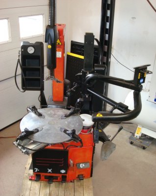 AE Technologies Inc - Automotive Tire Changer